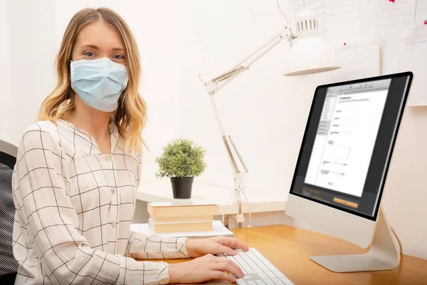 Young Business Woman Working Home Wearing Protective Mask — Stock Photo © katy89 #352846912