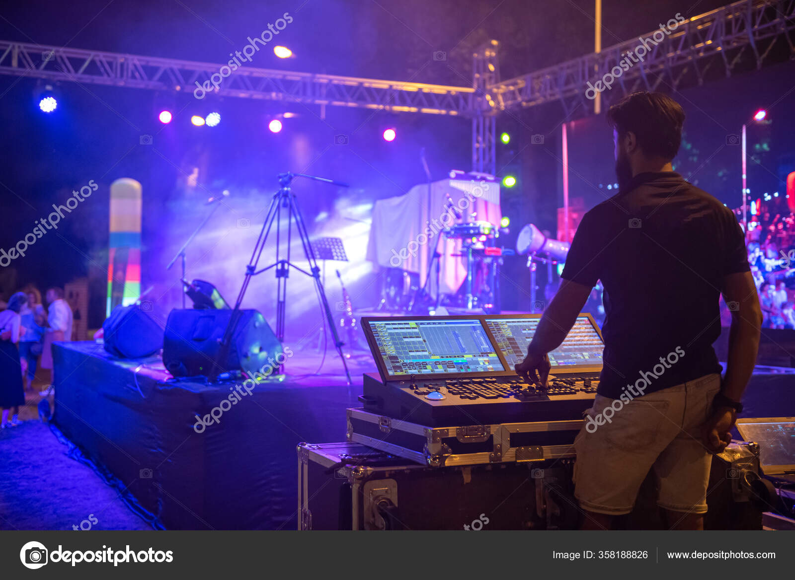 Sound engineer team working to prepare for music concert stage. Hand ...