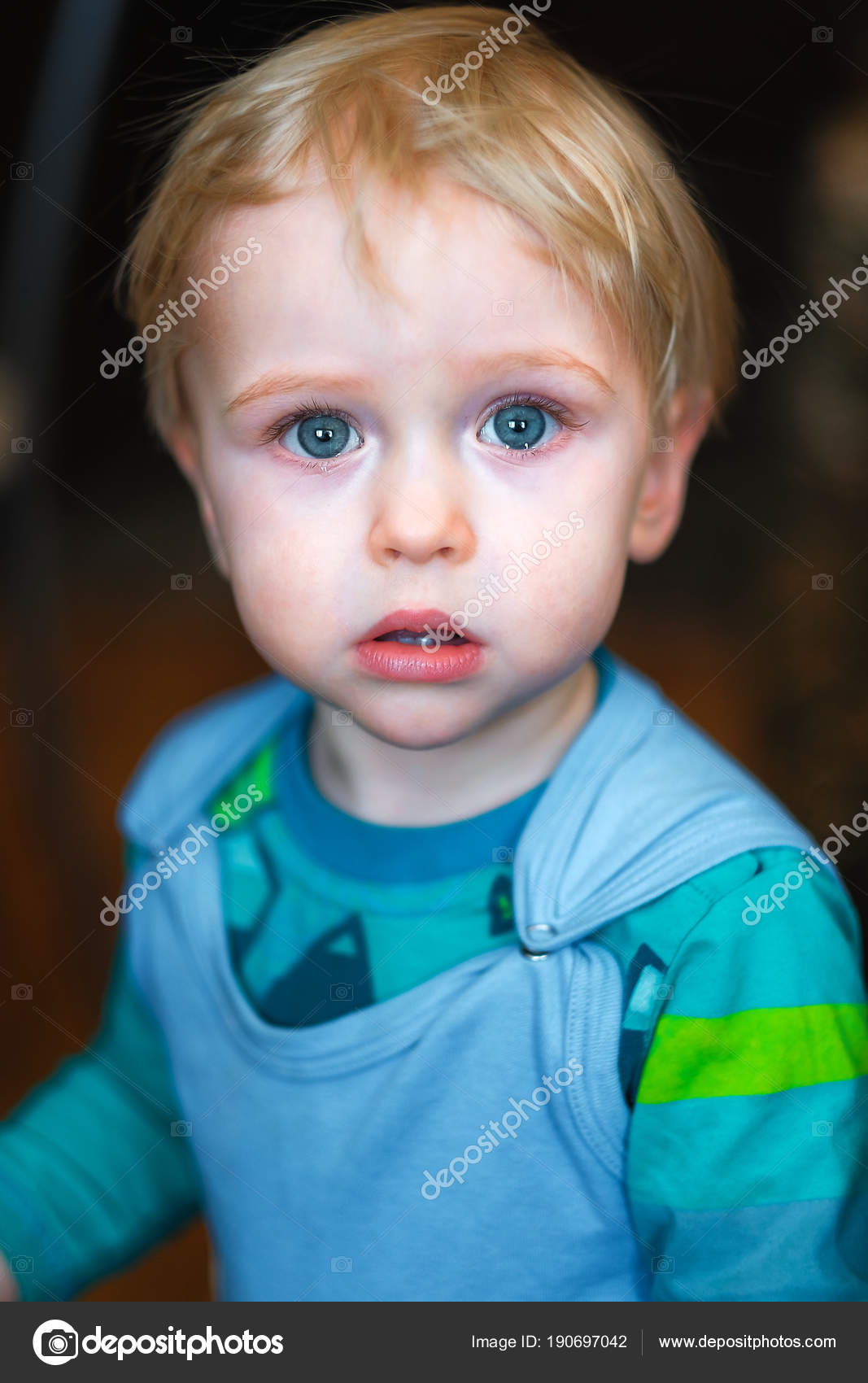 Cranky baby cries Stock Photo by ©seroma.72@mail.ru 190697042