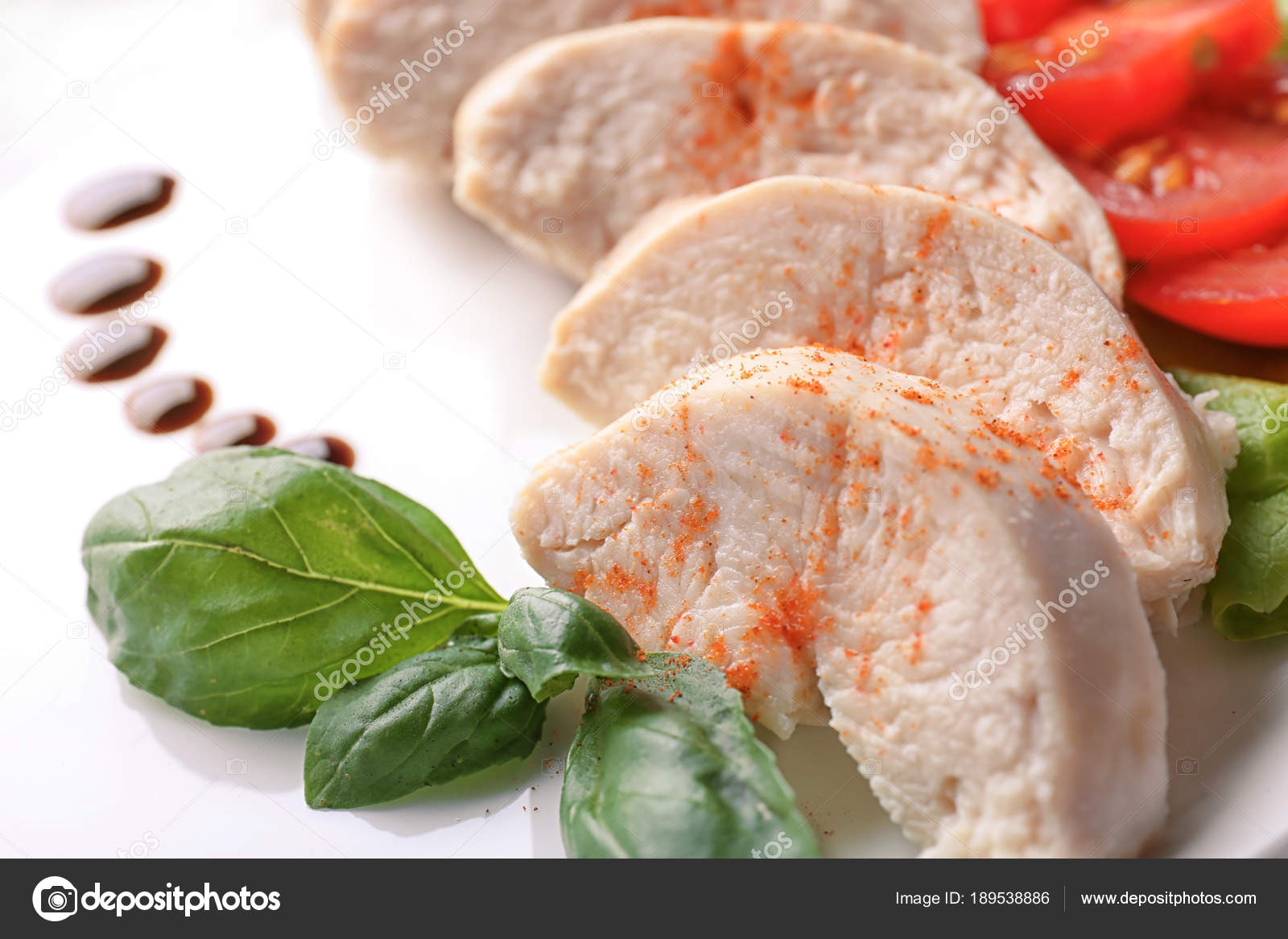 Boiled chicken fillet and garnish on plate, closeup Stock Photo by ...