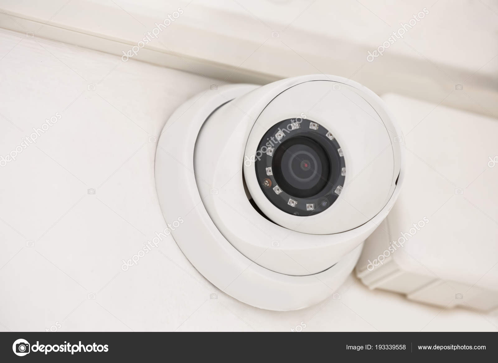Modern CCTV camera installed on wall in room — Stock Photo © serezniy ...
