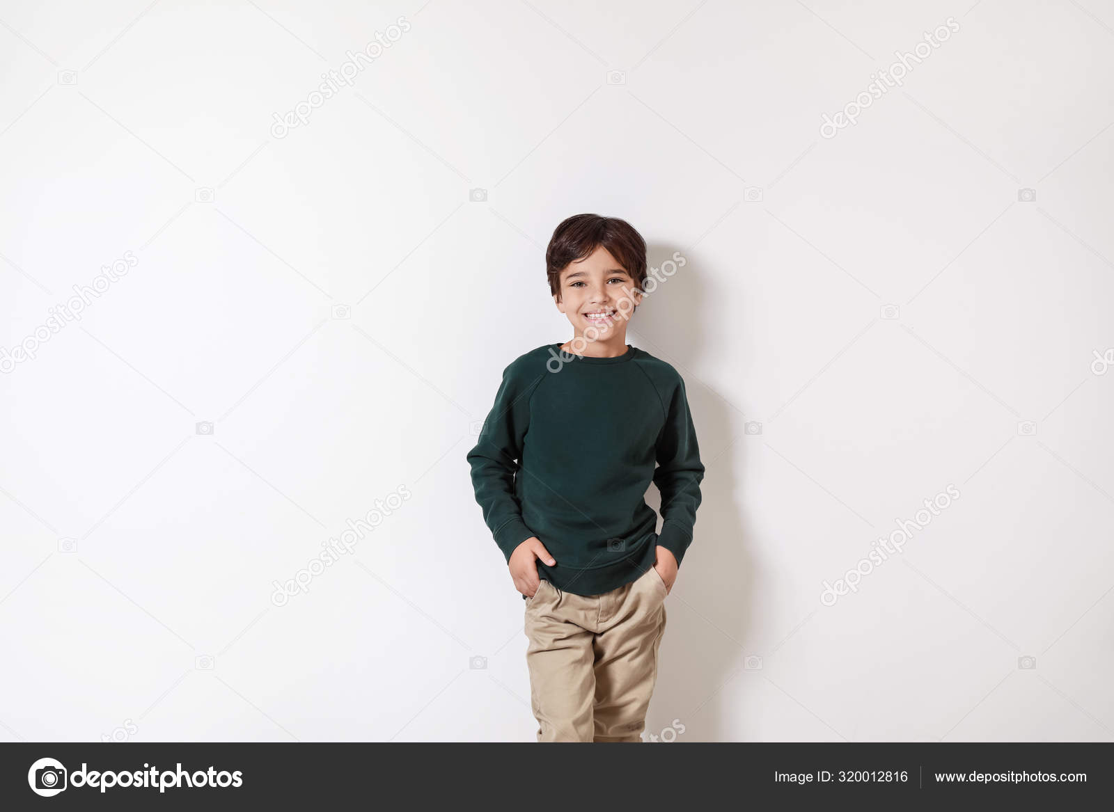 Cute little boy on light background ⬇ Stock Photo, Image by © serezniy ...