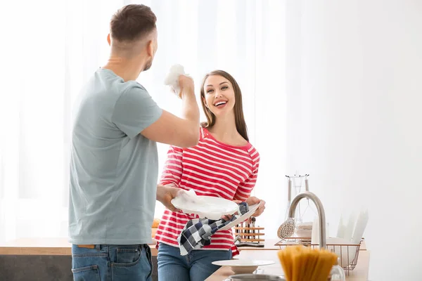 Couple washing dishes together Stock Photos, Royalty Free Couple ...