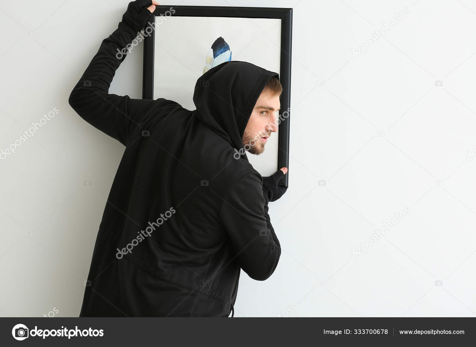 Thief stealing picture from art gallery — Stock Photo © serezniy #333700678