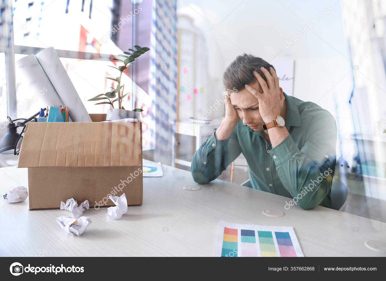 Sad Fired Man Sitting Table Office Stock Photo by ©serezniy 357662868
