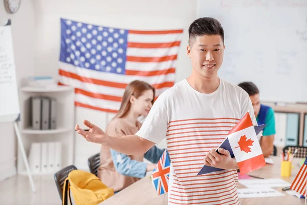 Male Asian student at language school - Stock Image - Everypixel