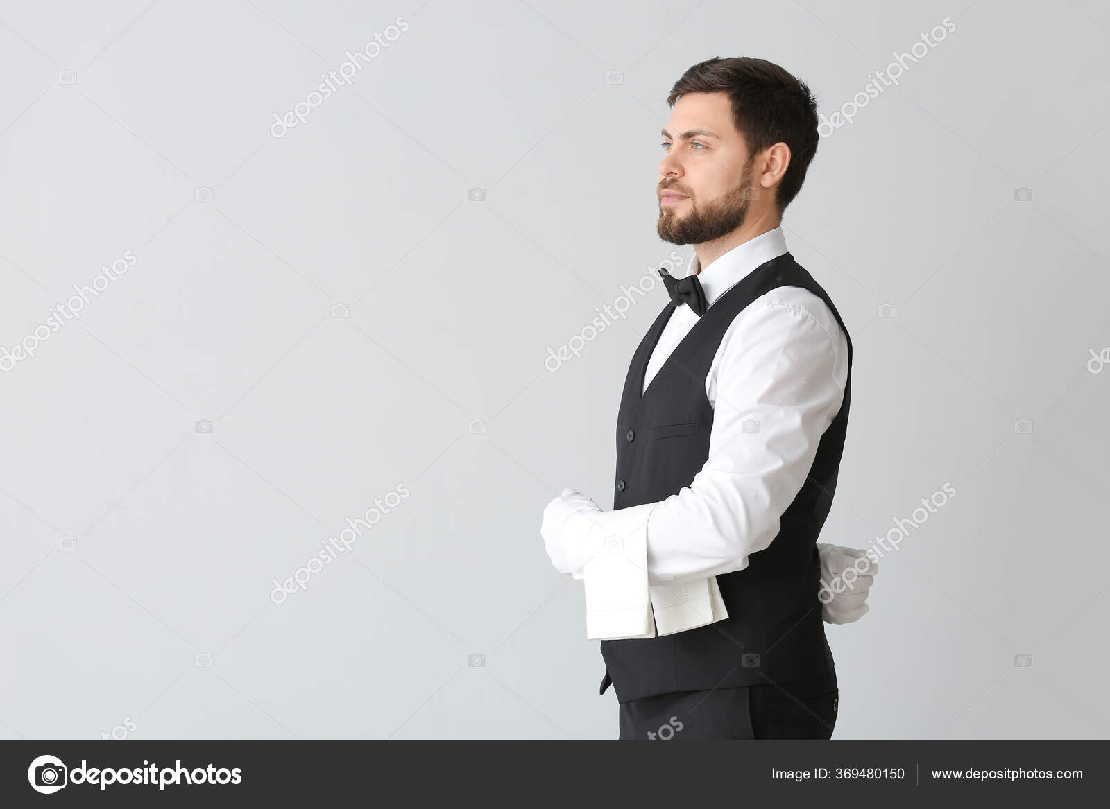 Handsome Male Waiter Grey Background Stock Photo by ©serezniy 369480150