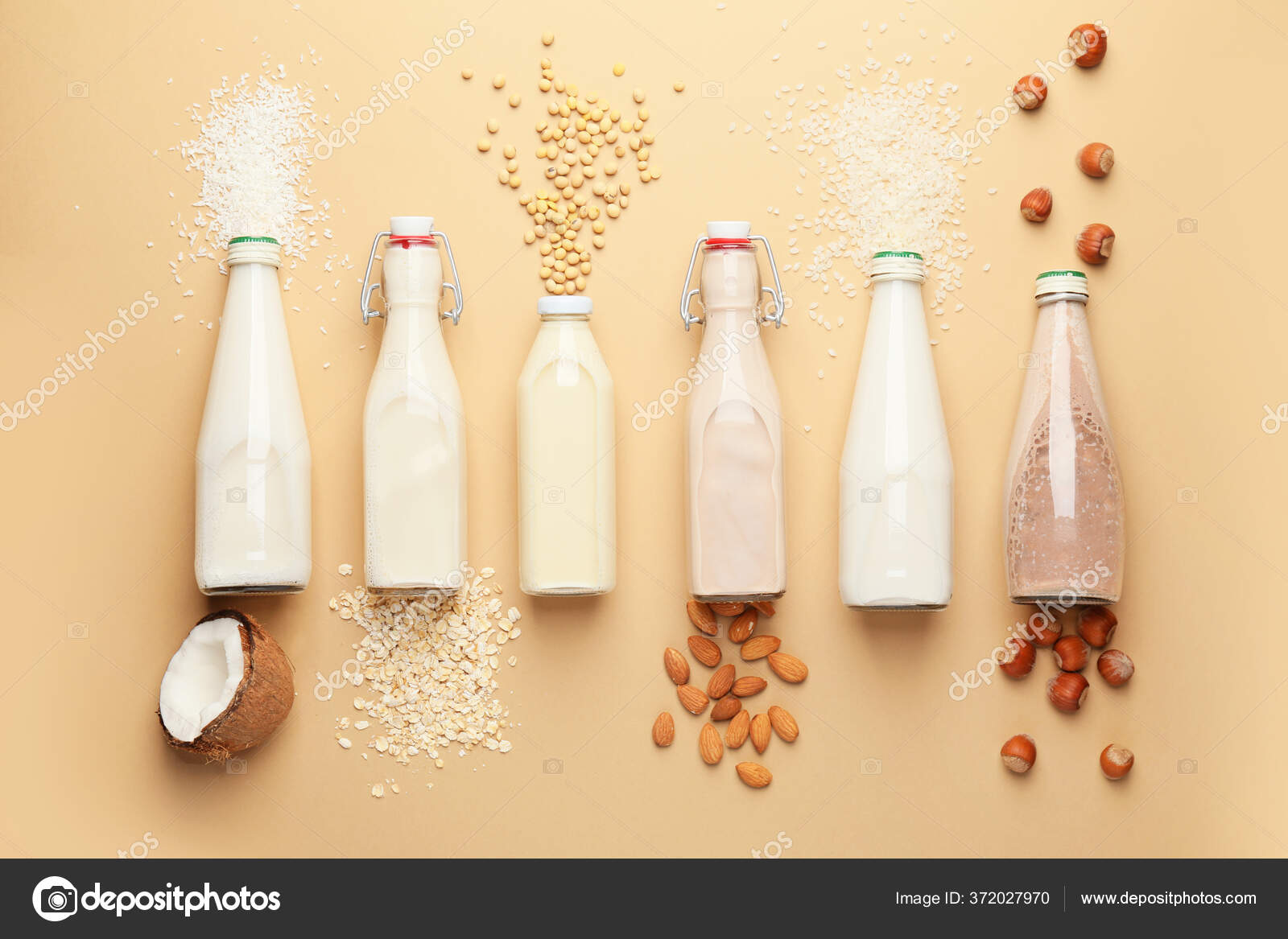 Bottles Different Milk Color Background Stock Photo by ©serezniy 372027970