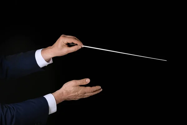 Senior Male Conductor Grey Background Stock Photo by ©serezniy 372456926