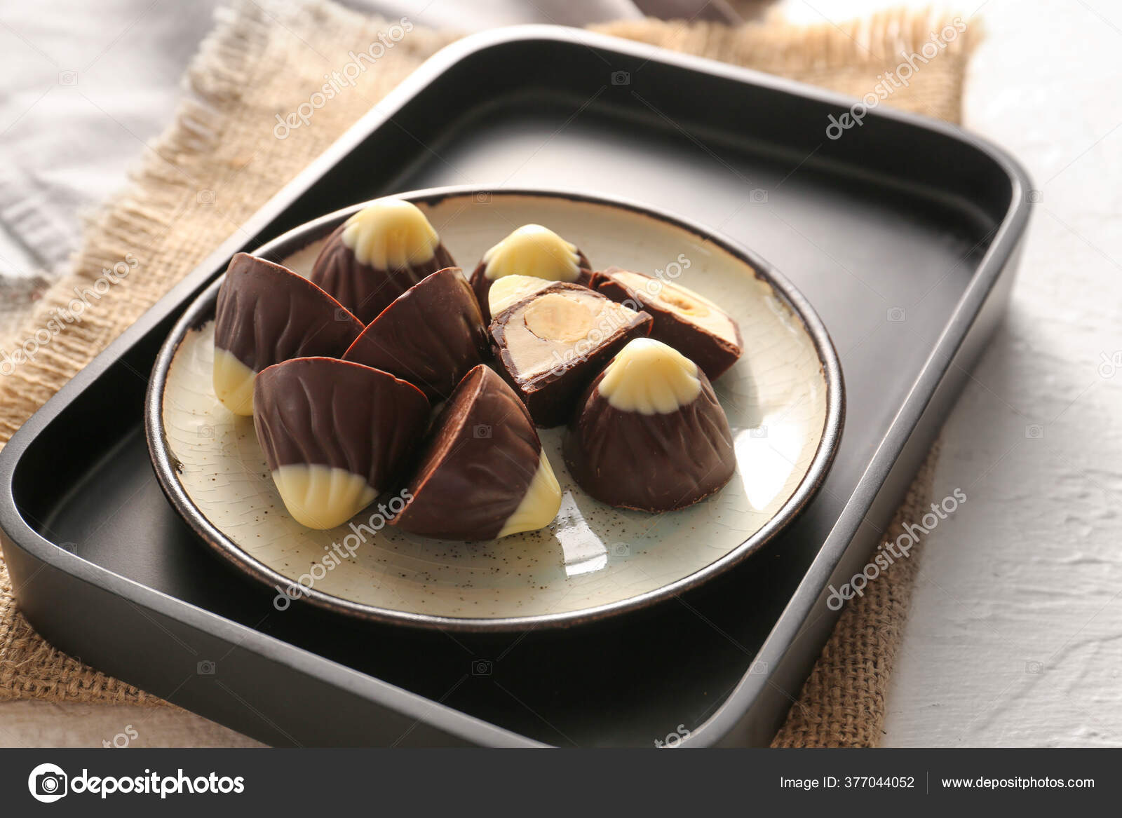 Plate Tasty Chocolate Candies White Background — Stock Photo © serezniy ...