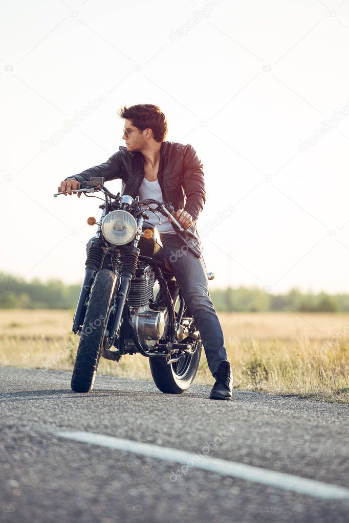 Biker riding his motorcycle — Stock Photo © zorandim #159502280