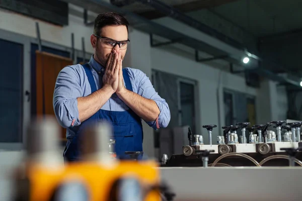 Industrial worker being worried for bad results in production. - Stock ...