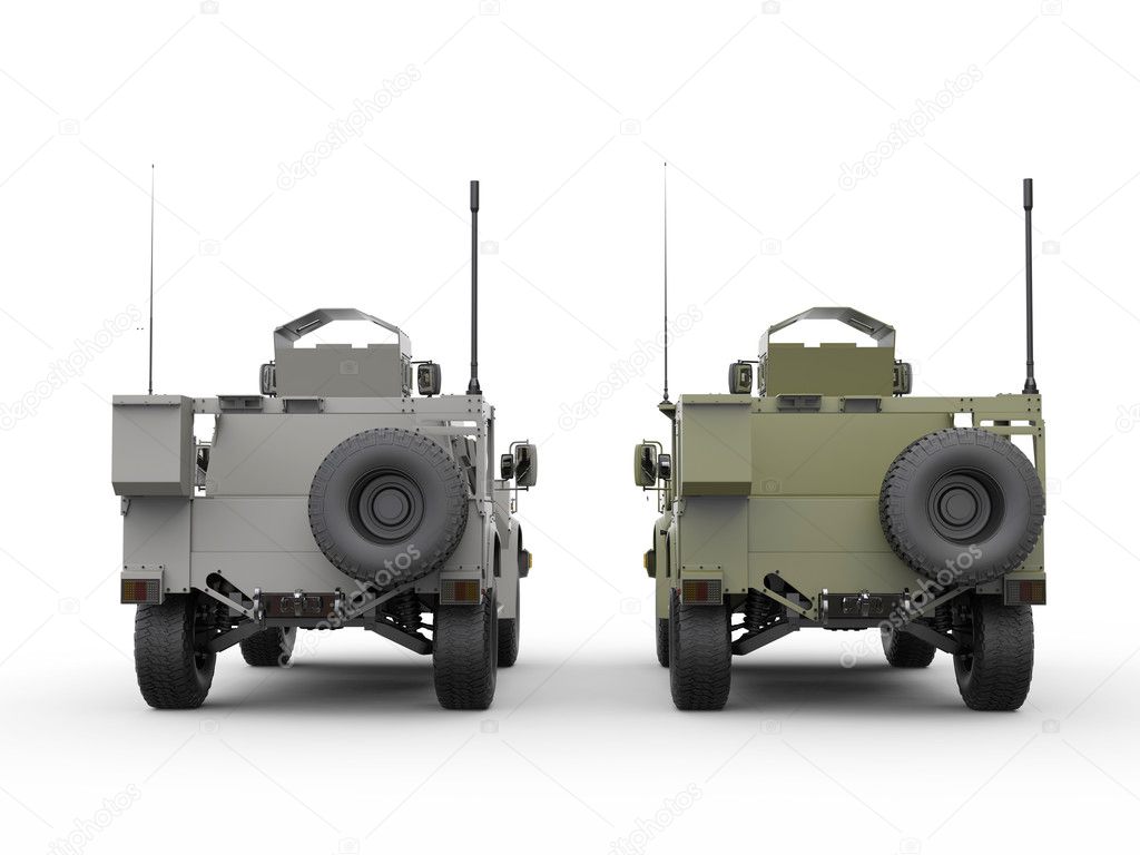 Military all terrain tactical vehicles - green and grey - rear view ...