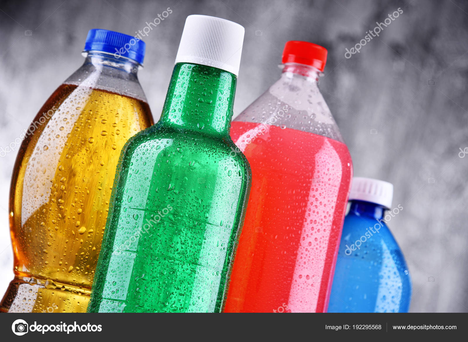 Plastic bottles of assorted carbonated soft drinks Stock Photo by ...