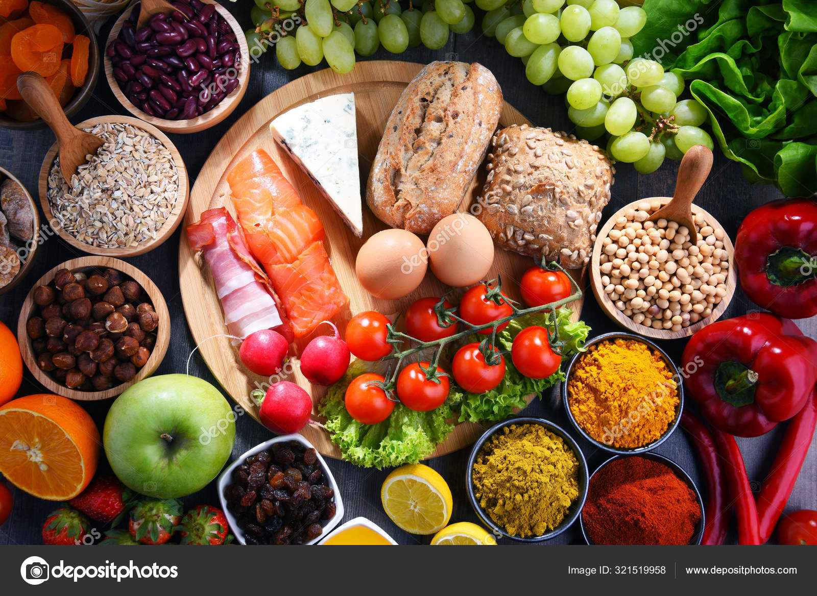 Assorted organic food products on the table Stock Photo by ©monticello ...