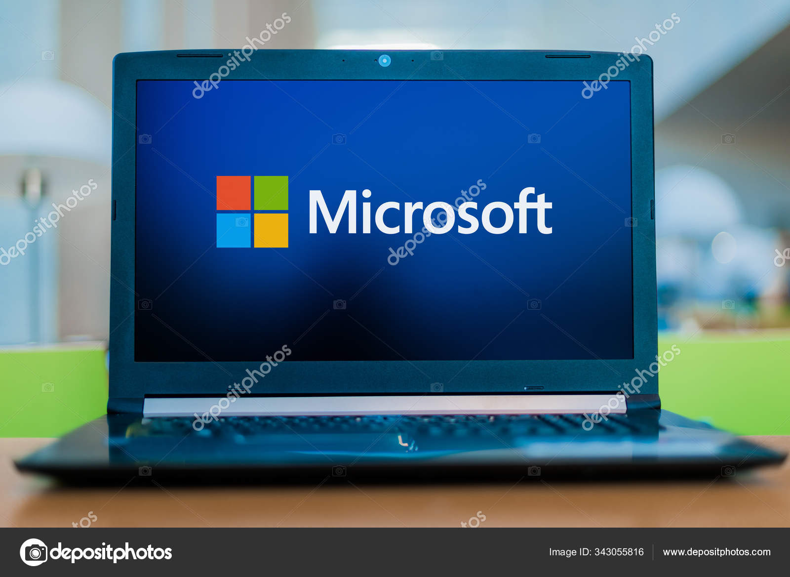 Laptop computer displaying logo of Microsoft — Stock Editorial Photo ...