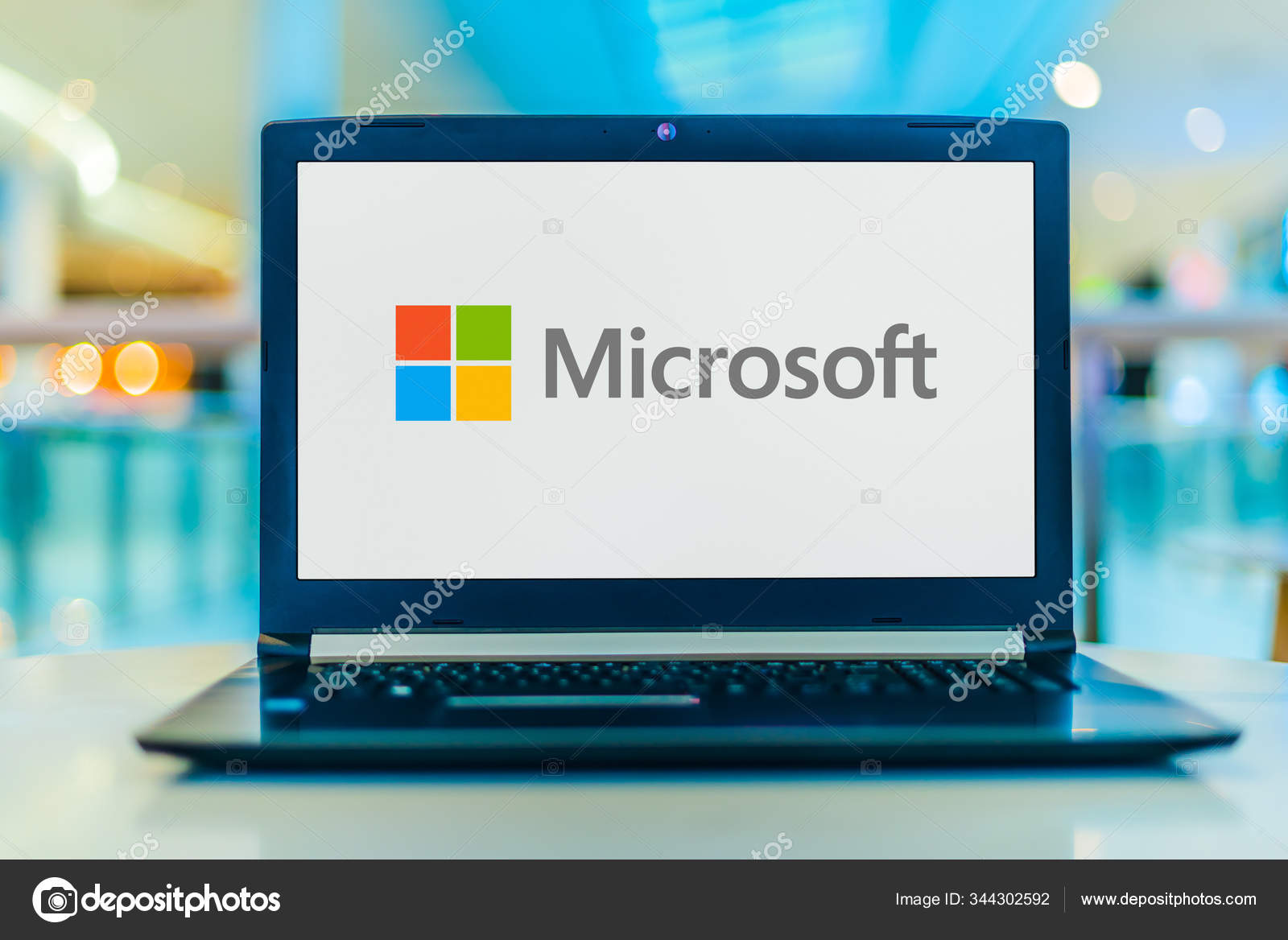 Laptop computer displaying logo of Microsoft — Stock Editorial Photo ...