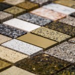 Colorful samples of natural stone in different sizes used as a kitchen ...