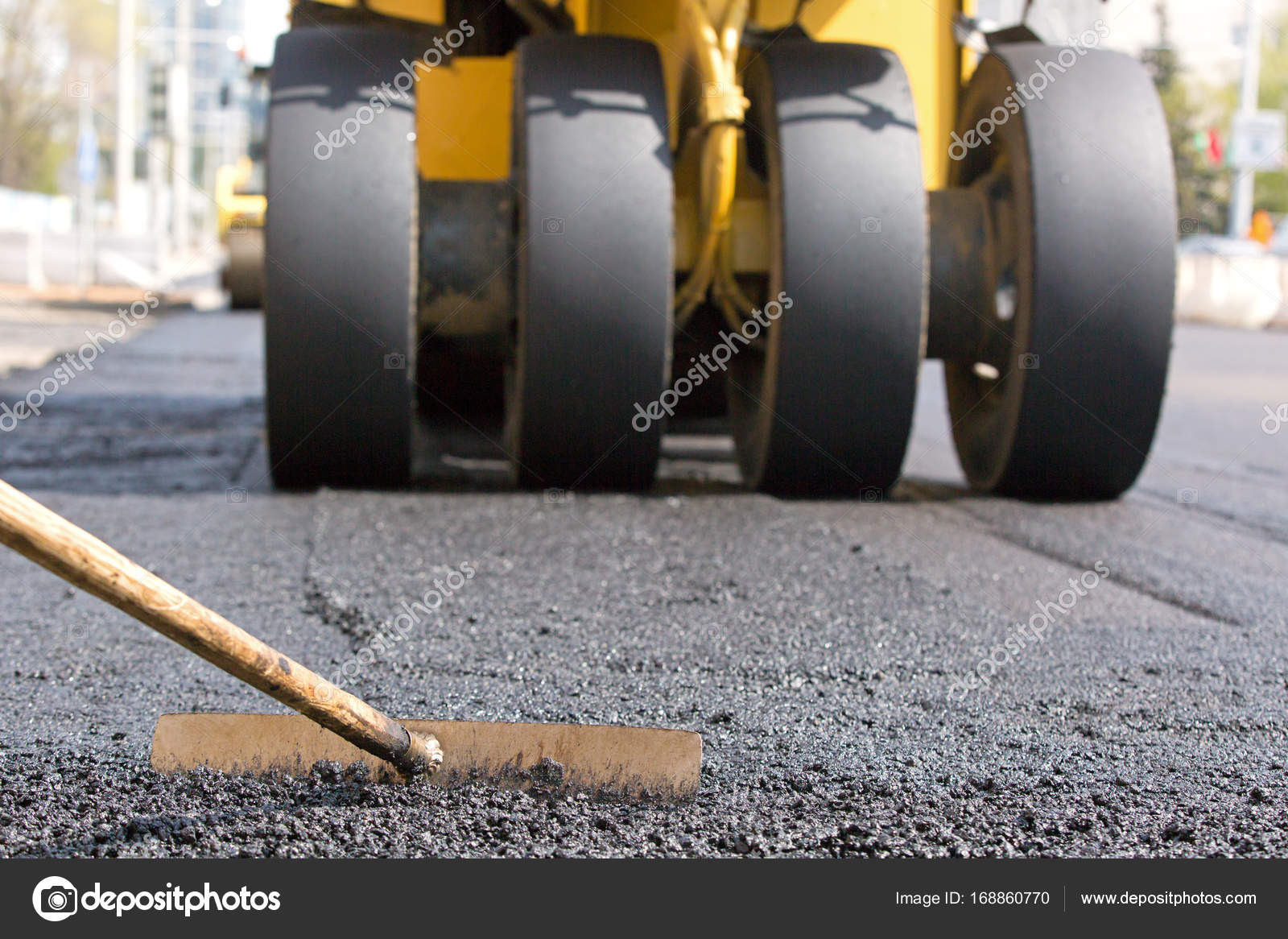 Compaction asphalt concrete mixtures — Stock Photo © Bambulla #168860770