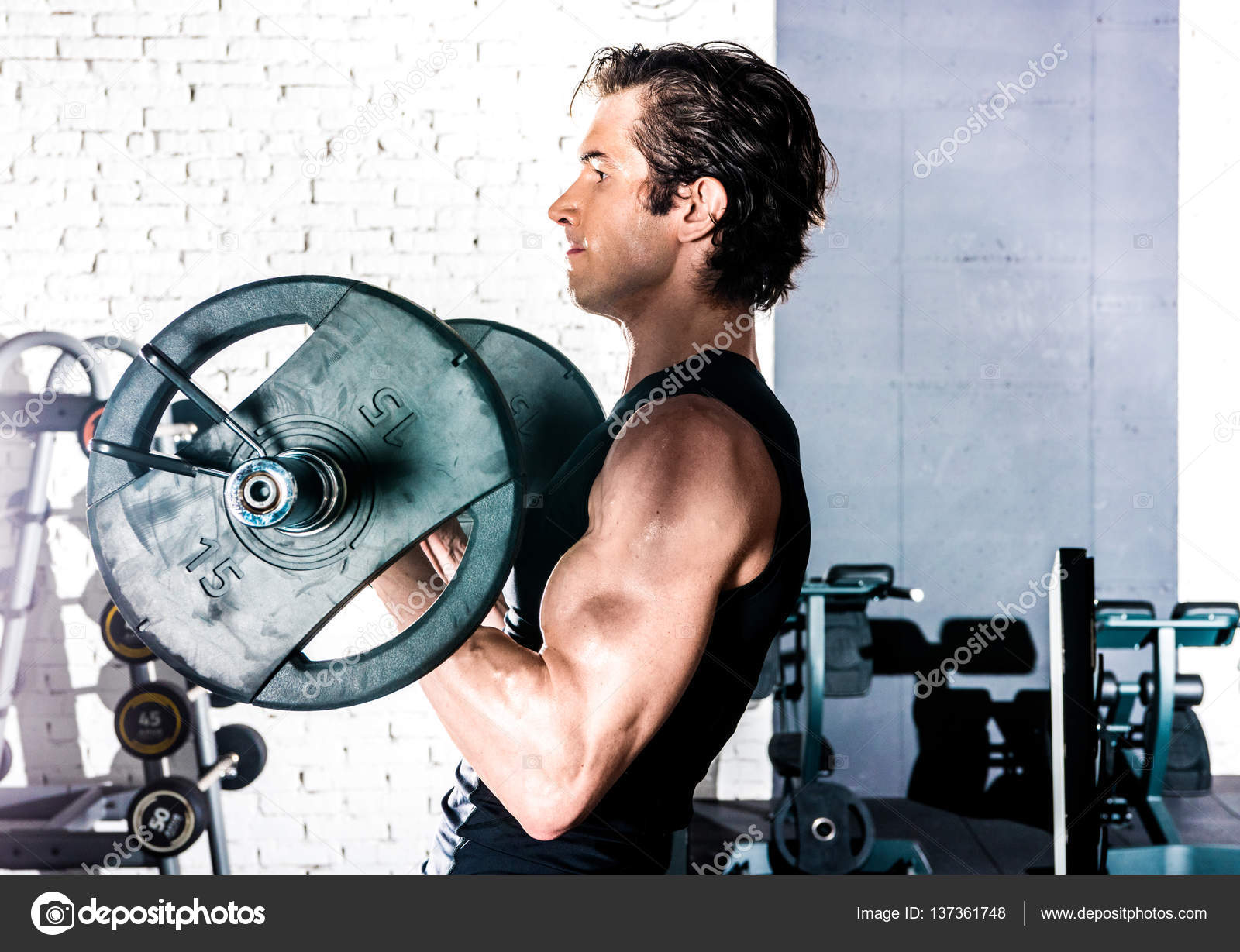 Man exercising in gym — Stock Photo © DimaGavrish #137361748