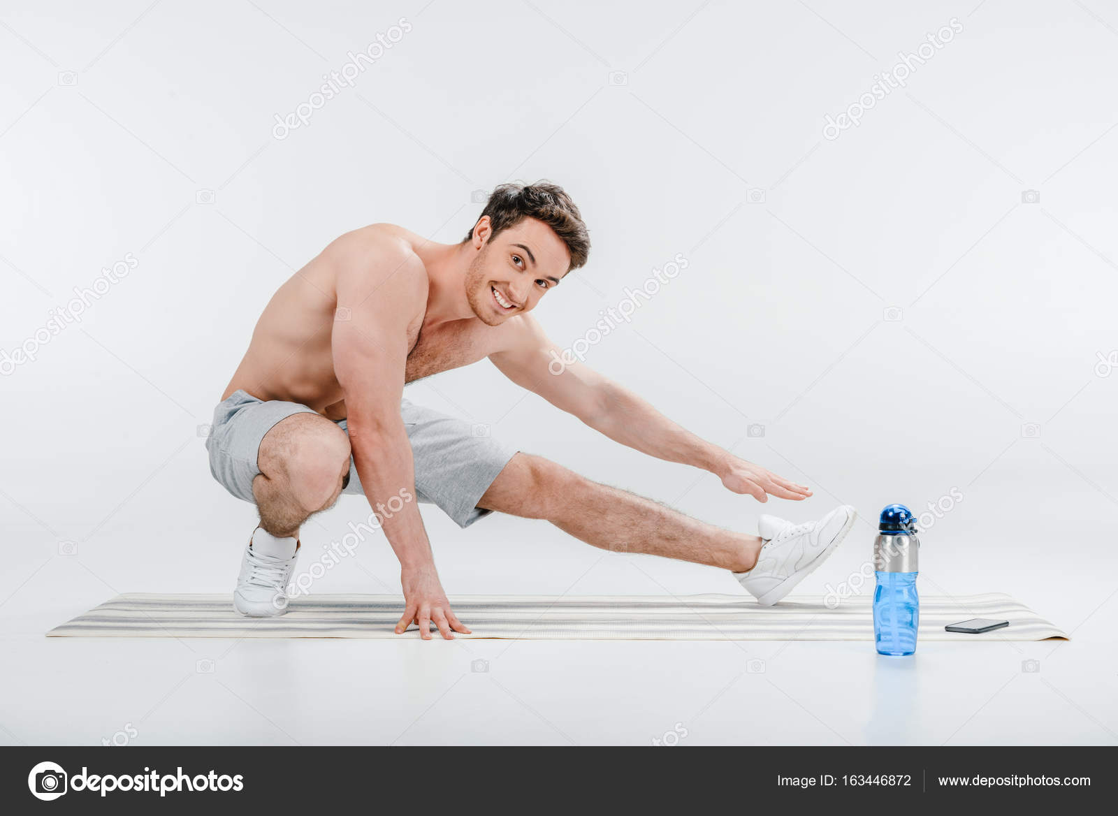 Young man stretching — Stock Photo © DimaGavrish #163446872