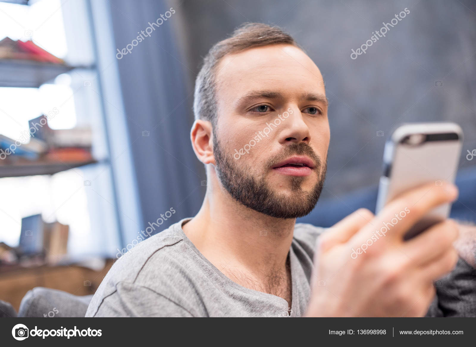 Man using smartphone — Stock Photo © TarasMalyarevich #136998998