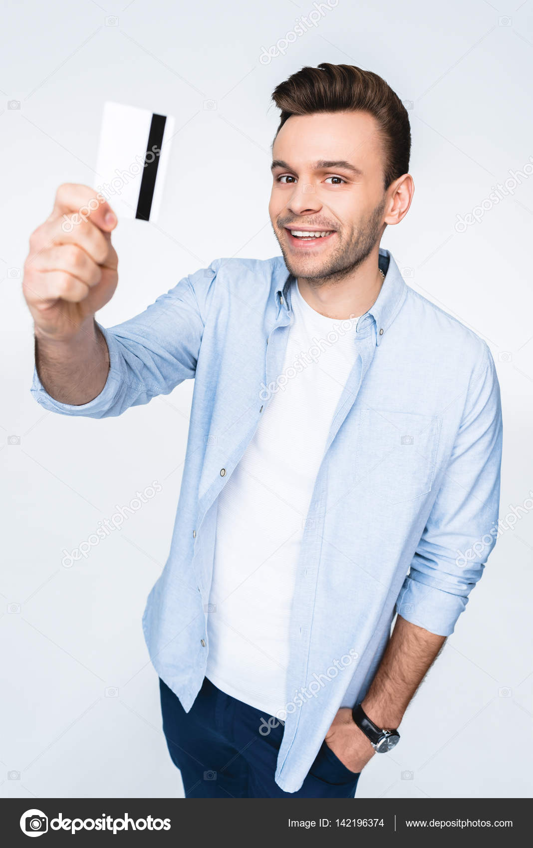 Man holding credit card — Stock Photo © TarasMalyarevich #142196374 Man holding credit card — Stock Photo © TarasMalyarevich #142196374