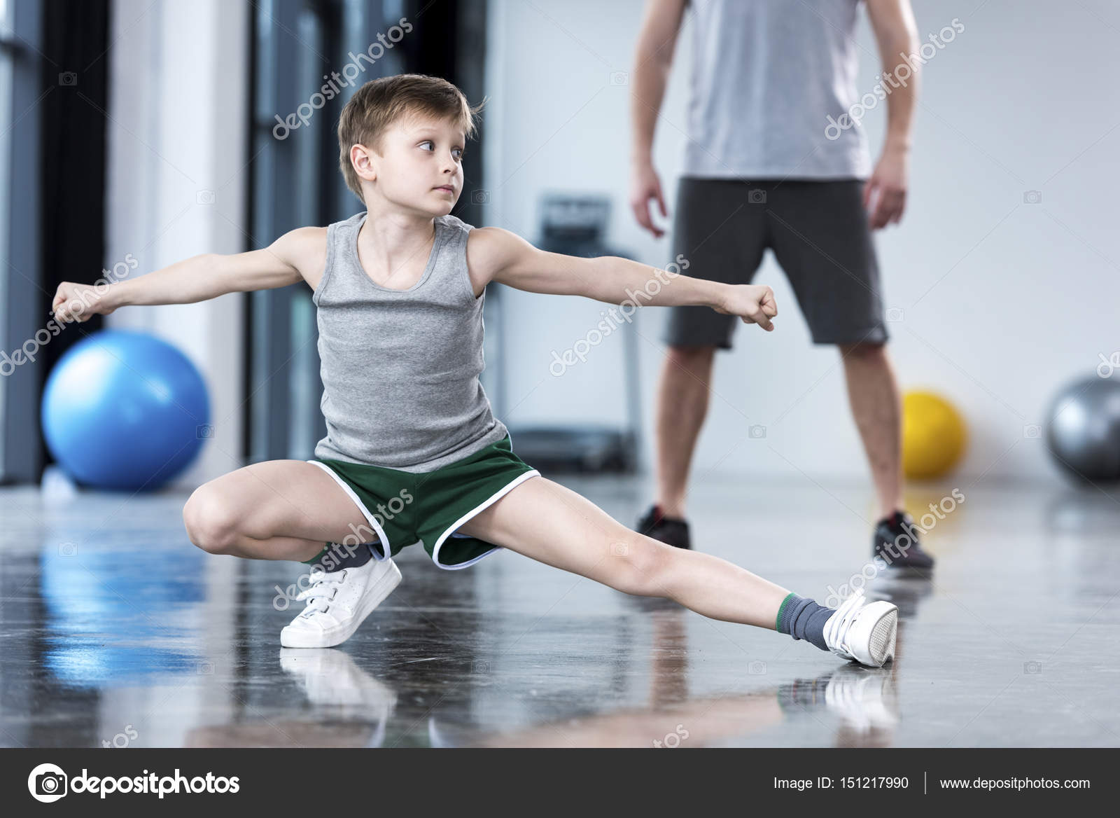 Boy doing stretching — Stock Photo © TarasMalyarevich #151217990