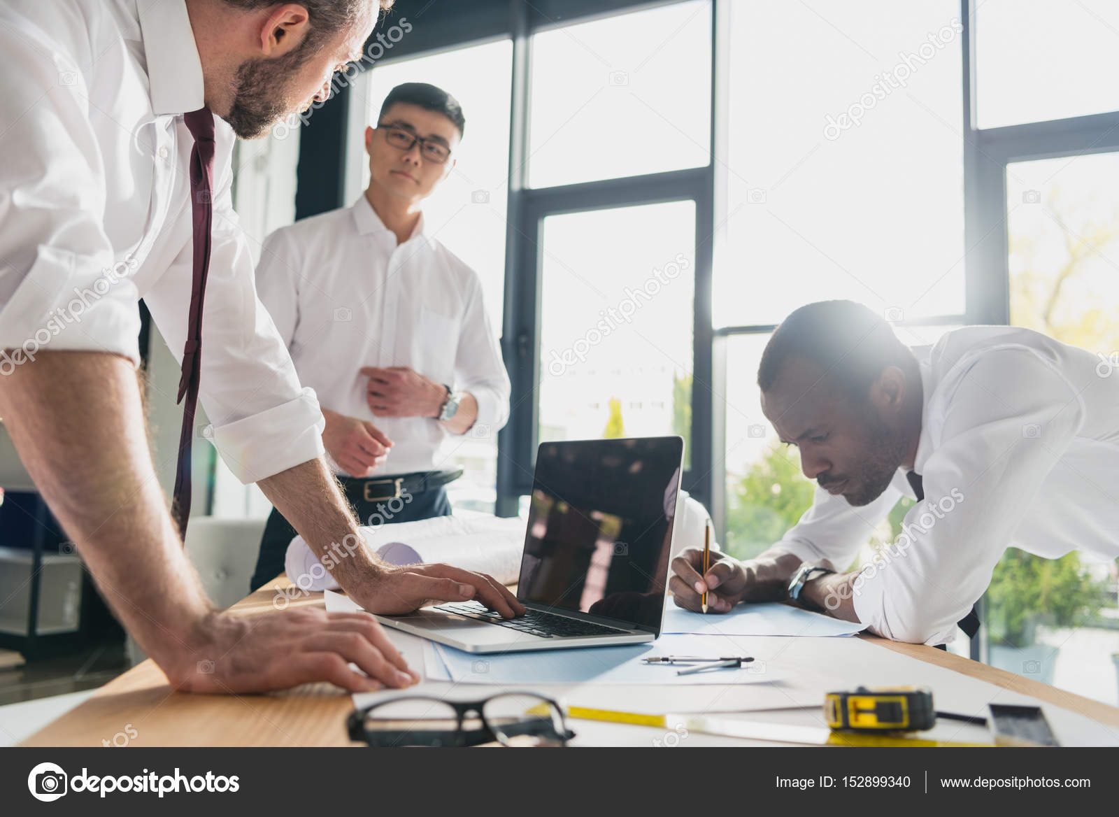 Professional architects working at modern office — Stock Photo ...
