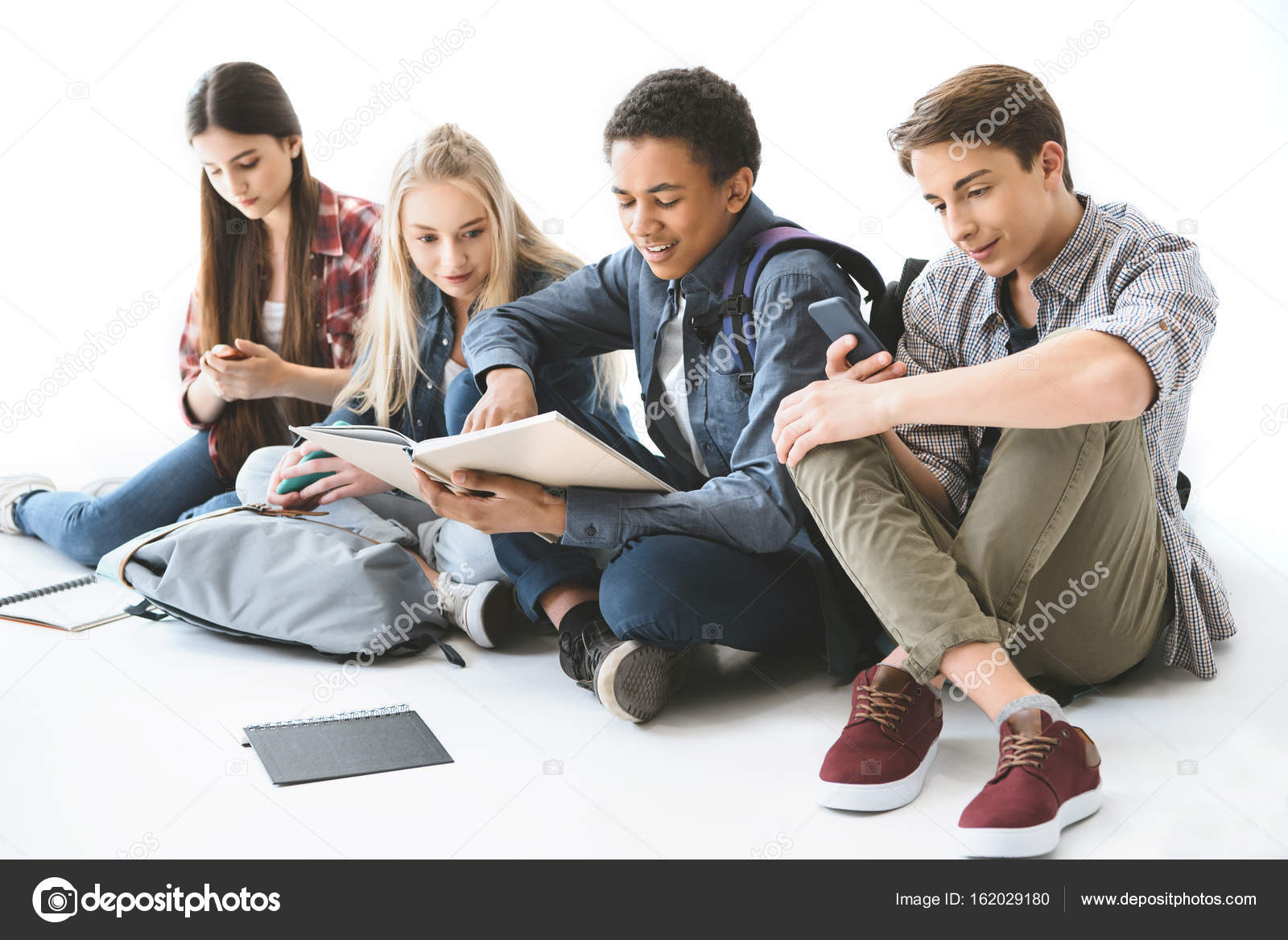 Multiethnic students doing homework — Stock Photo © TarasMalyarevich ... Multiethnic students doing homework — Stock Photo © TarasMalyarevich ...