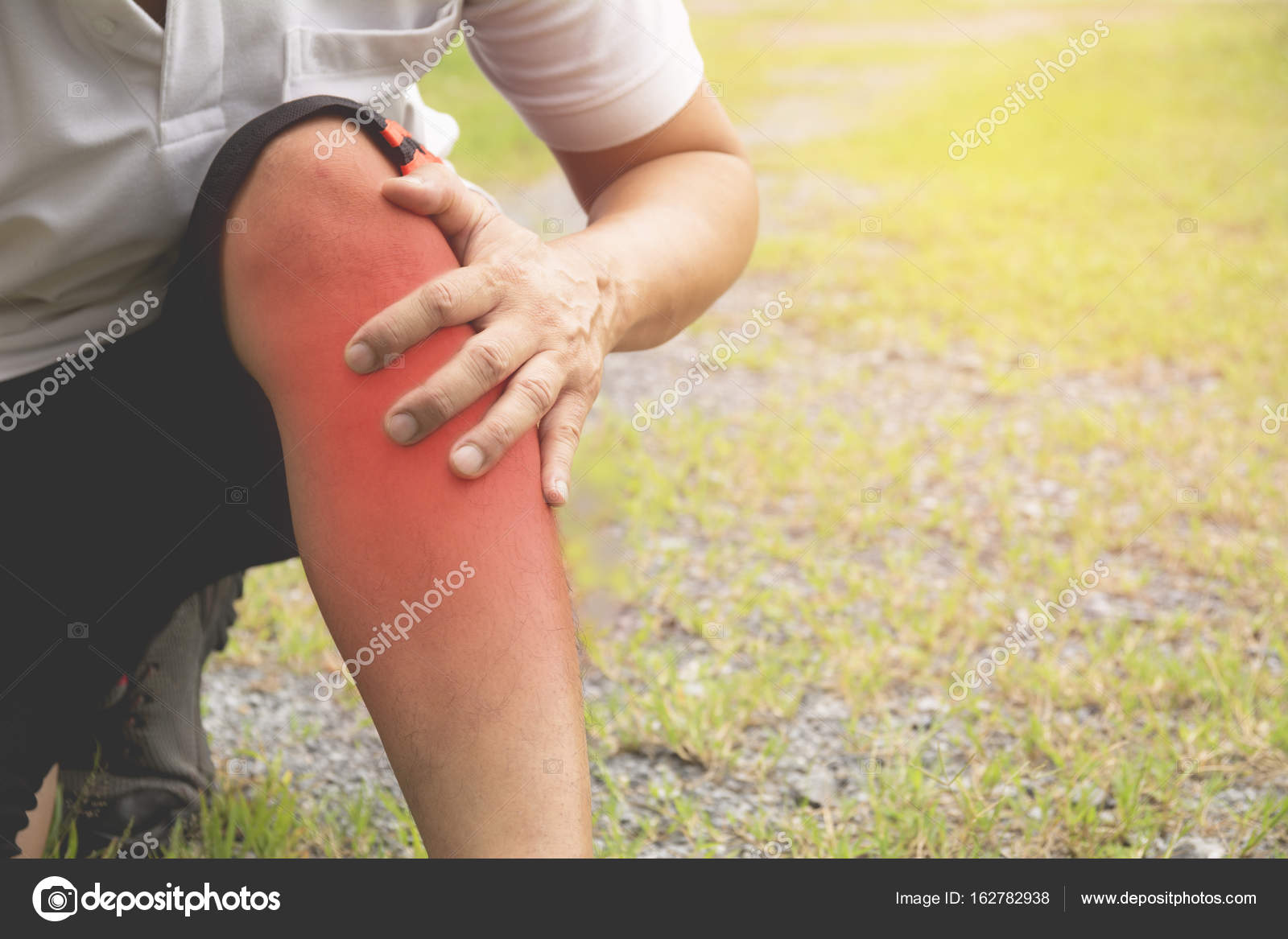 The guy clings to a bad leg. The pain in his leg after exercise. The ...