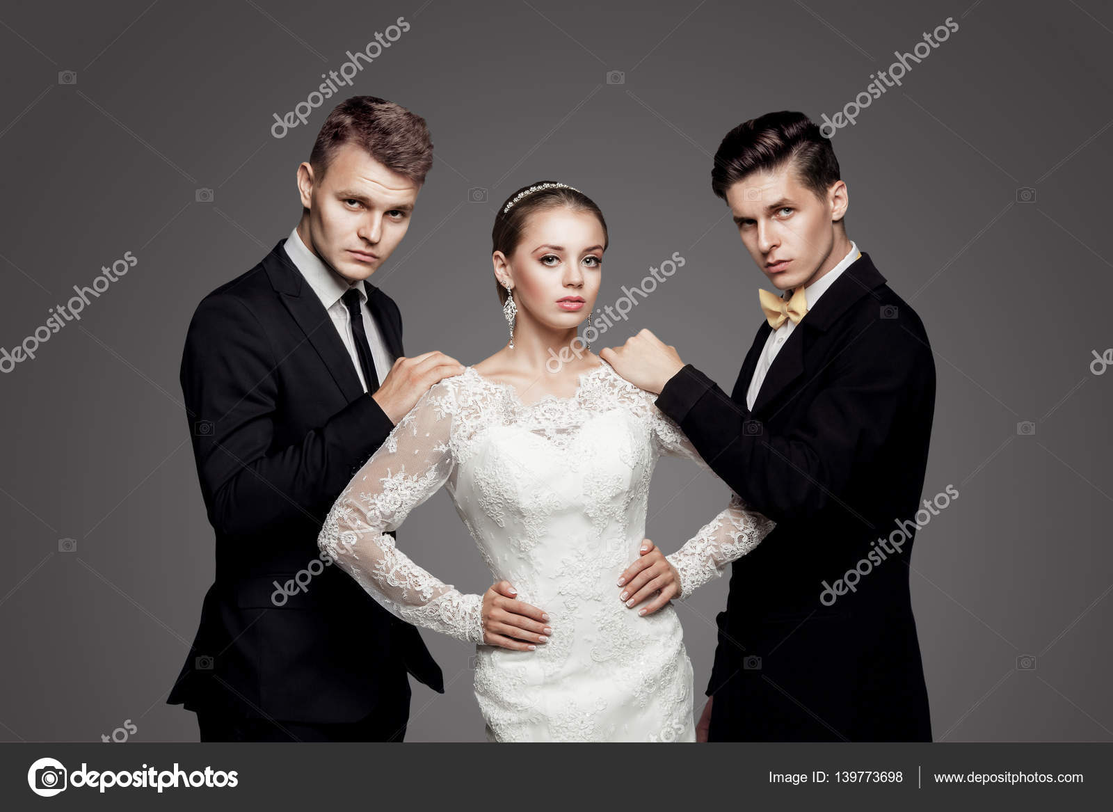 Two handsome men and beautiful bride, studio Stock Photo by ©stahov ...