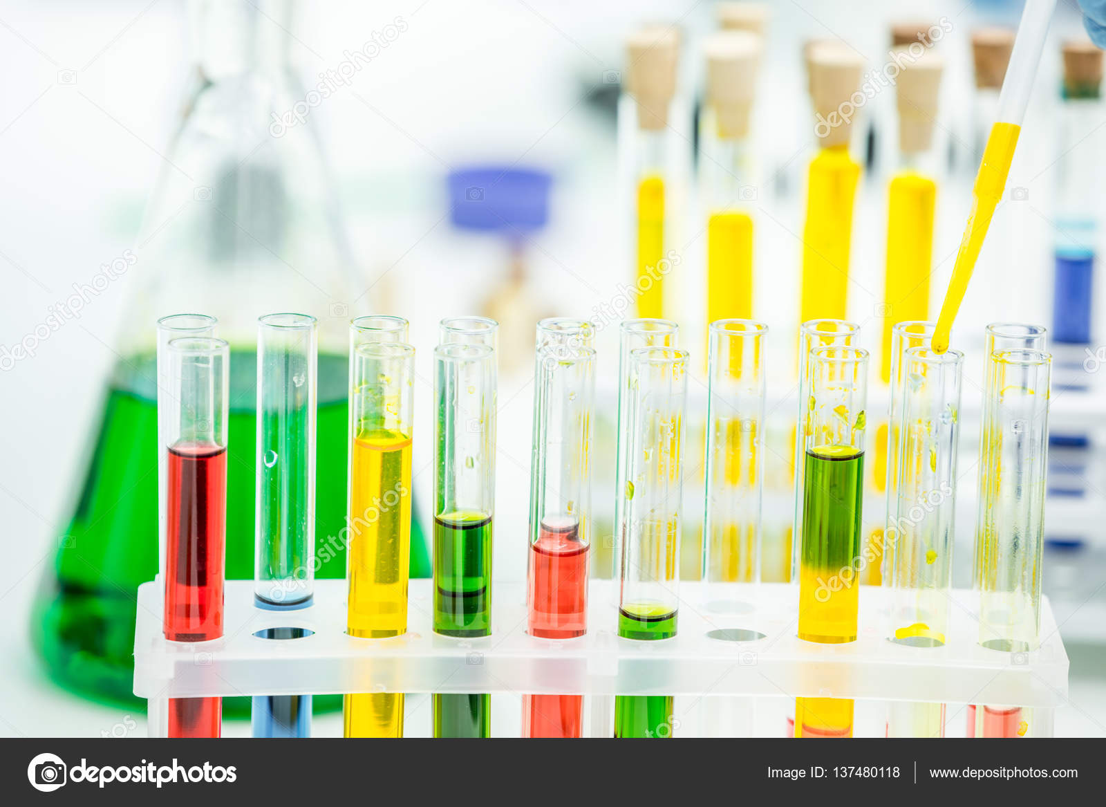 Test tubes with reagents — Stock Photo © AndreyBezuglov #137480118