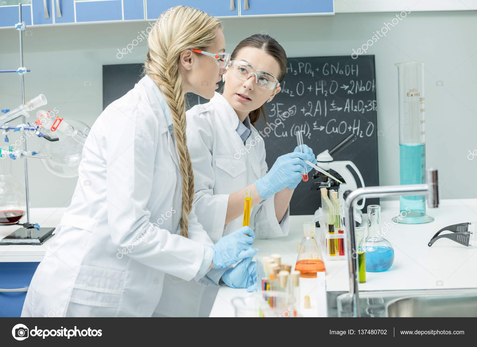 Female scientists in lab — Stock Photo © AndreyBezuglov #137480702