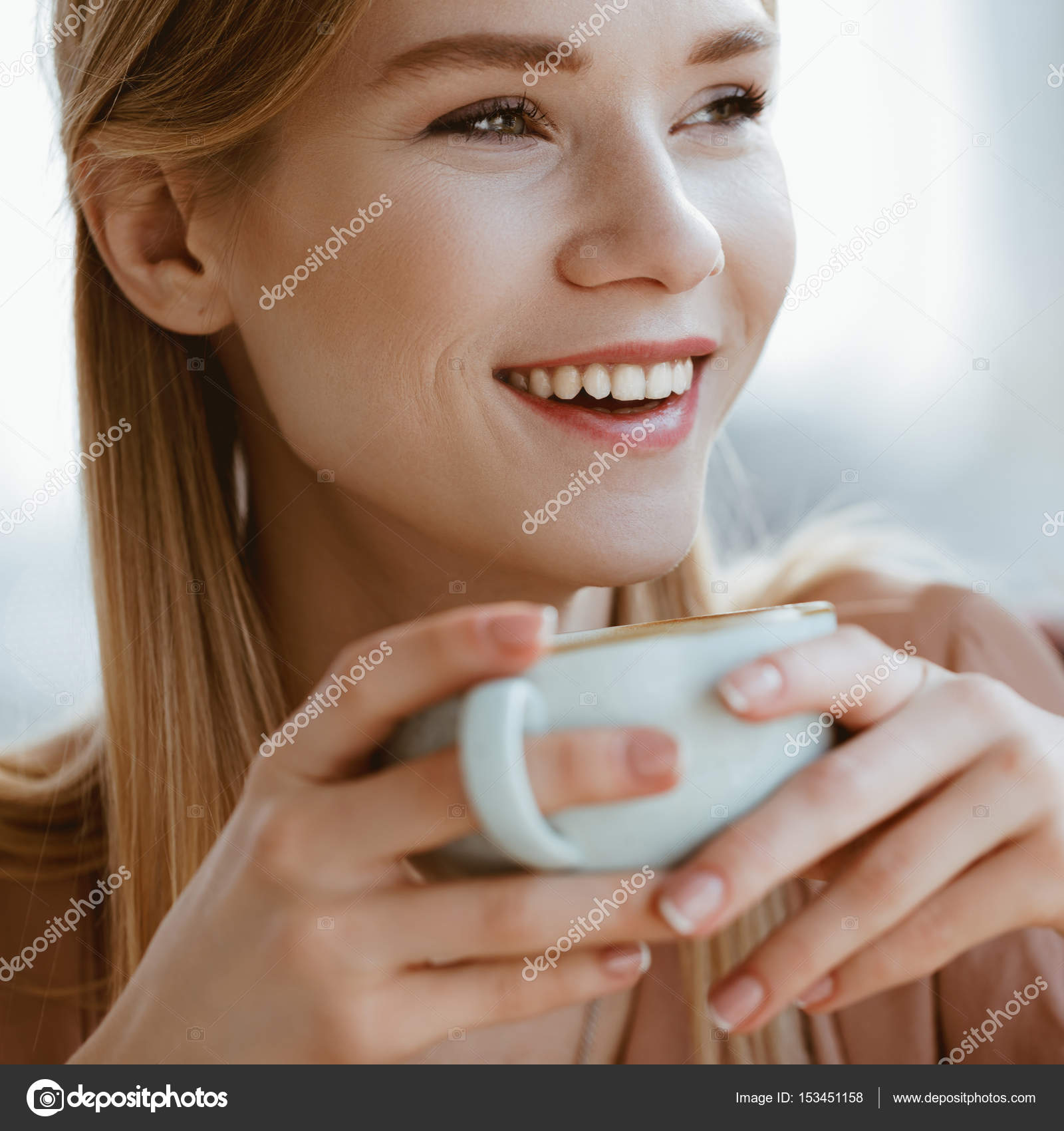 Girl drinking coffee Stock Photo by ©AndreyBezuglov 153451158