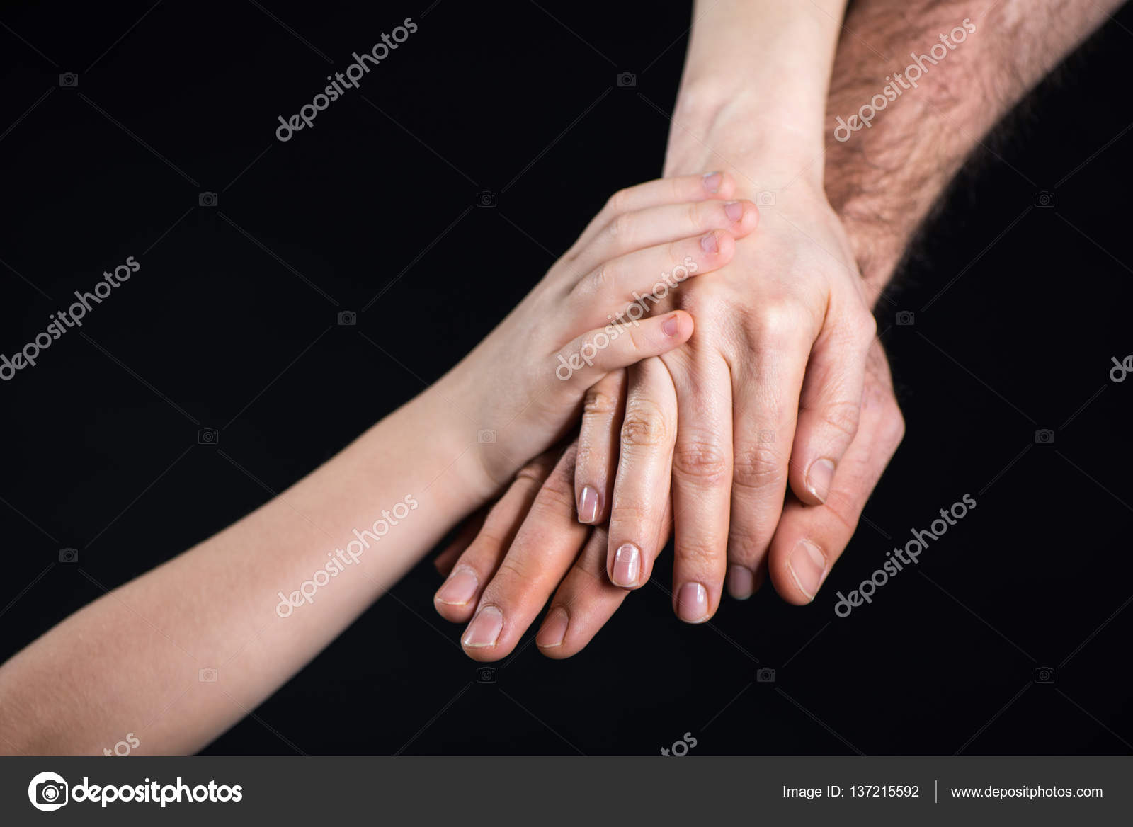 Family stacking hands Royalty Free Photo, Stock Image by © IgorTishenko ...