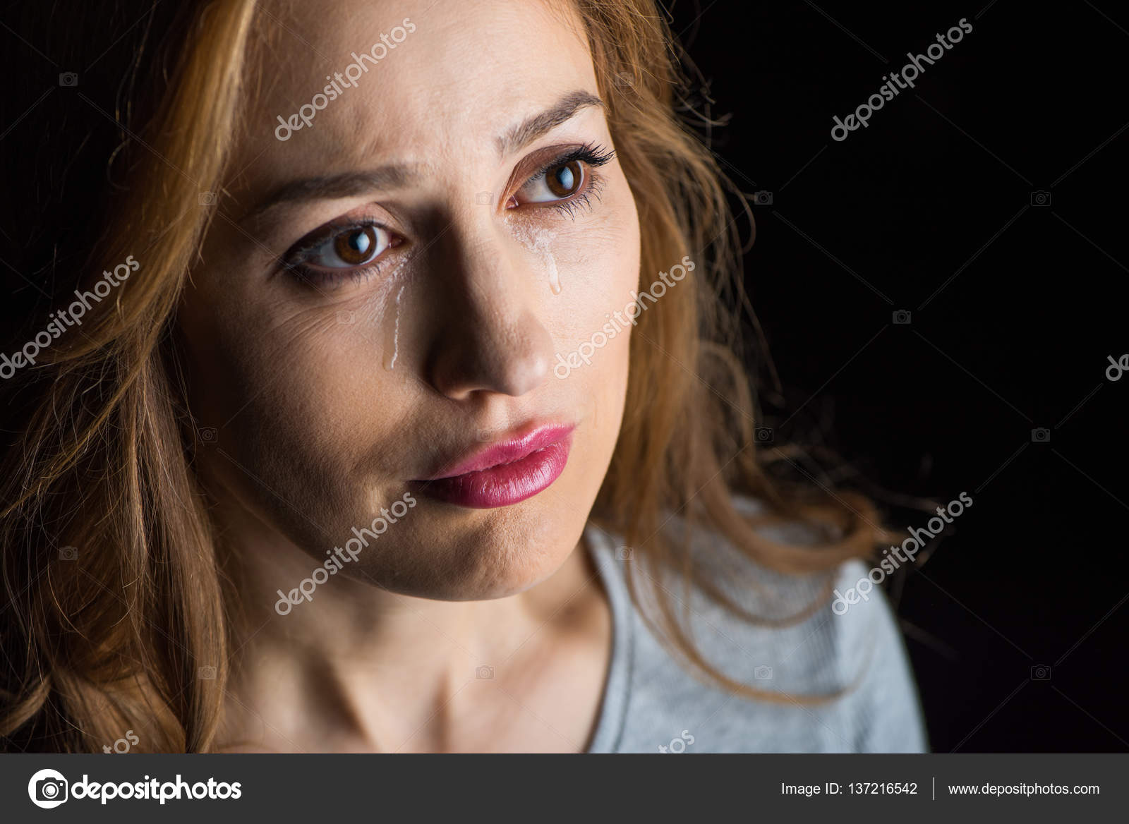 Young woman crying Stock Photo by ©IgorTishenko 137216542