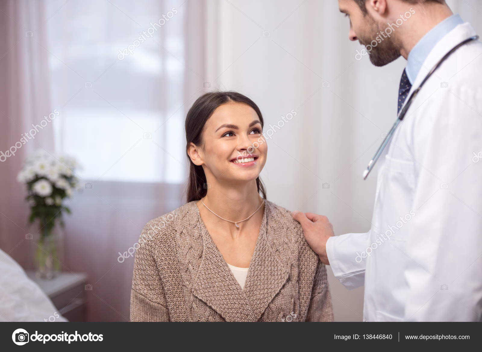 Doctor consulting patient — Stock Photo © IgorTishenko #138446840 Doctor consulting patient — Stock Photo © IgorTishenko #138446840