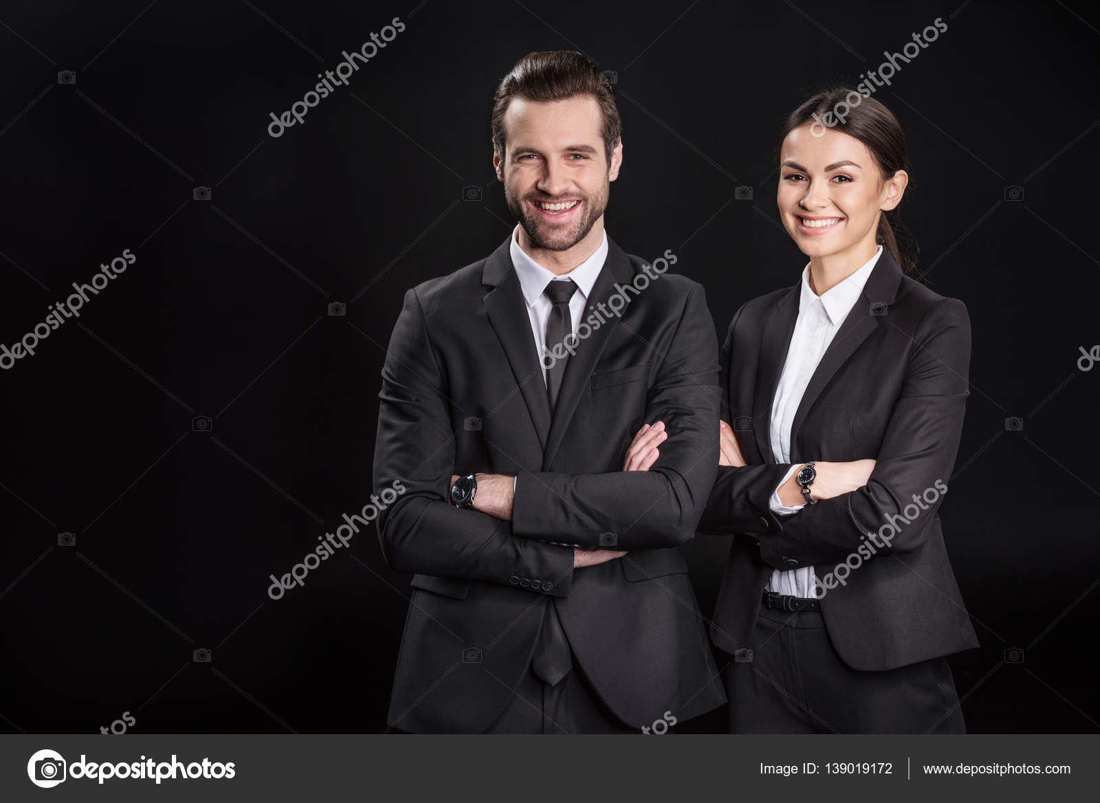 Young smiling businesspeople Stock Photo by ©IgorTishenko 139019172