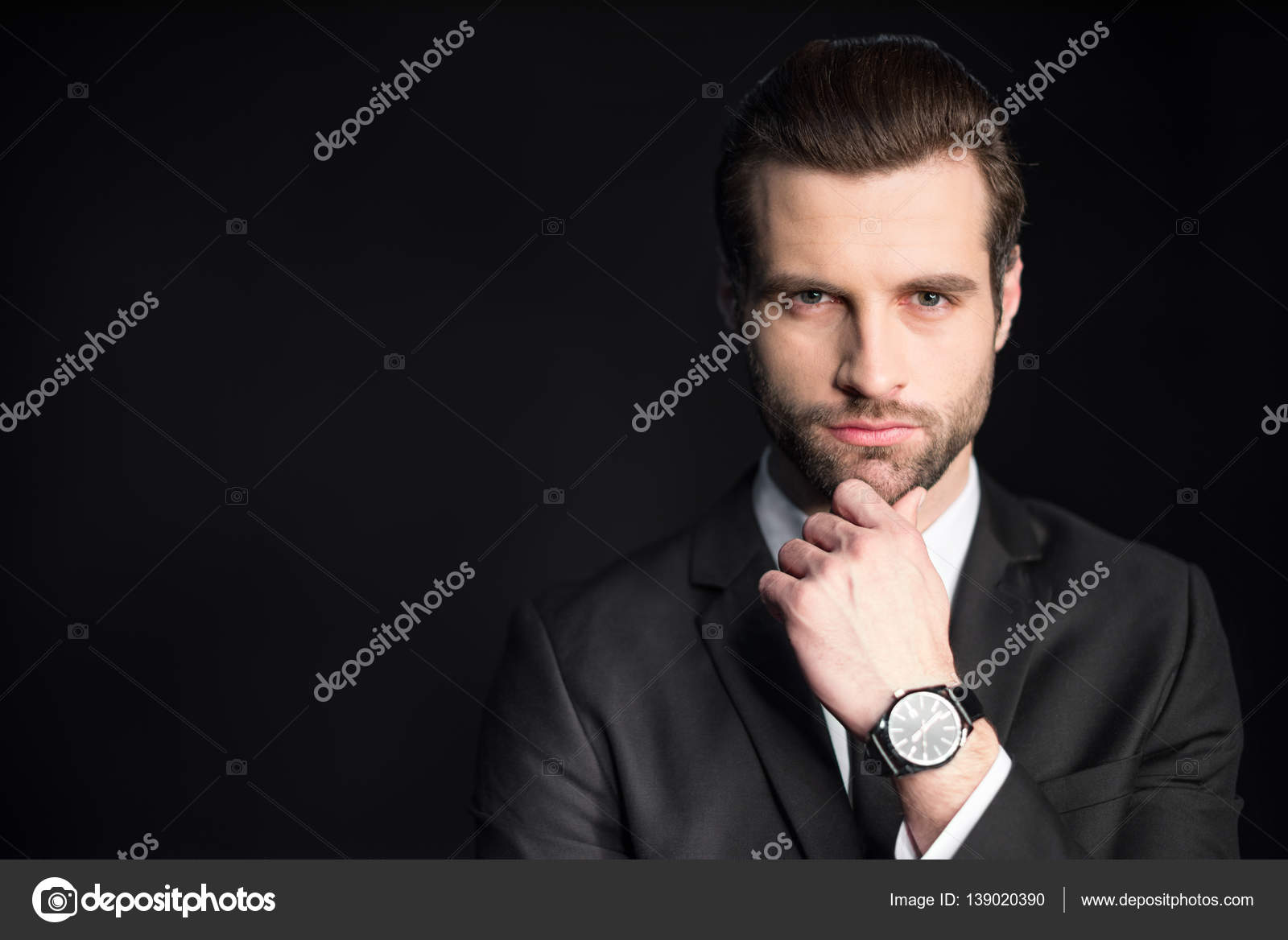 Young handsome businessman — Stock Photo © IgorTishenko #139020390 Young handsome businessman — Stock Photo © IgorTishenko #139020390