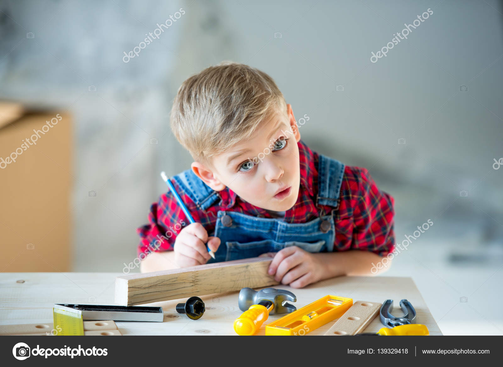 Little boy with tools — Stock Photo © IgorTishenko #139329418