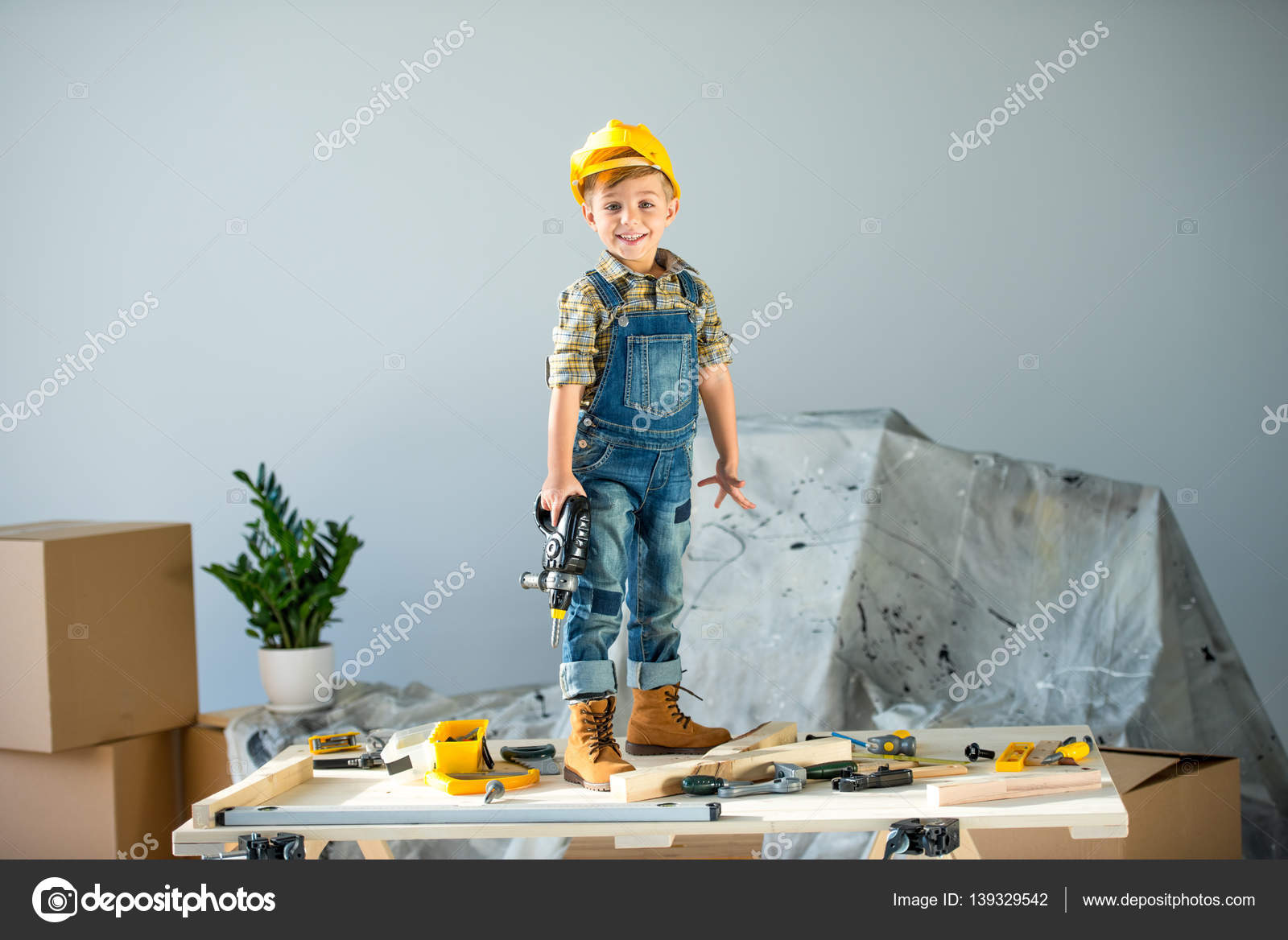 Little boy with tools — Stock Photo © IgorTishenko #139329542