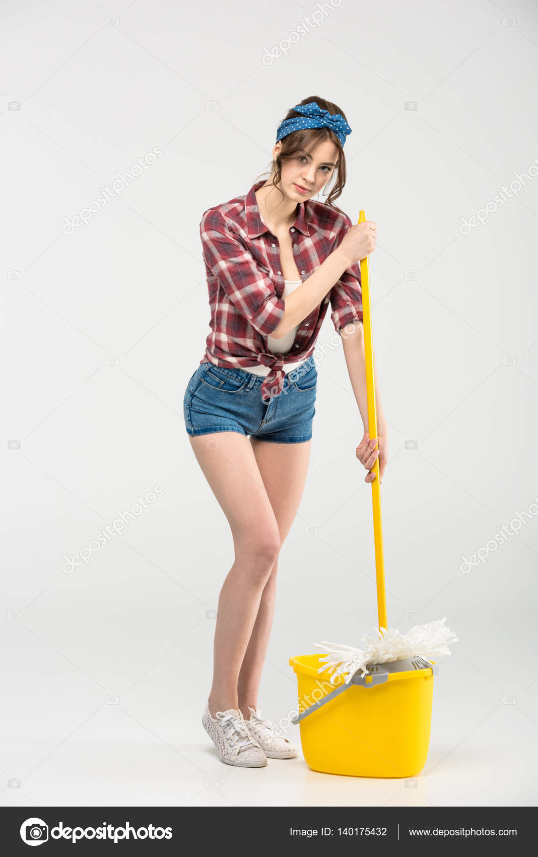 Young woman with mop — Stock Photo © IgorTishenko #140175432