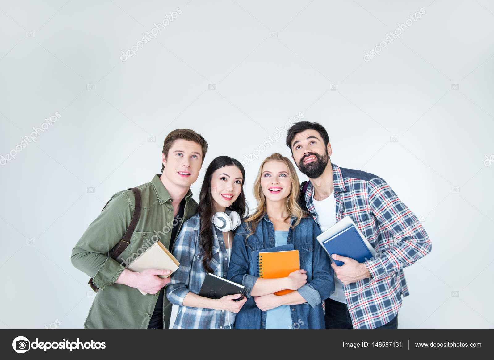 Four students with books — Stock Photo © IgorTishenko #148587131