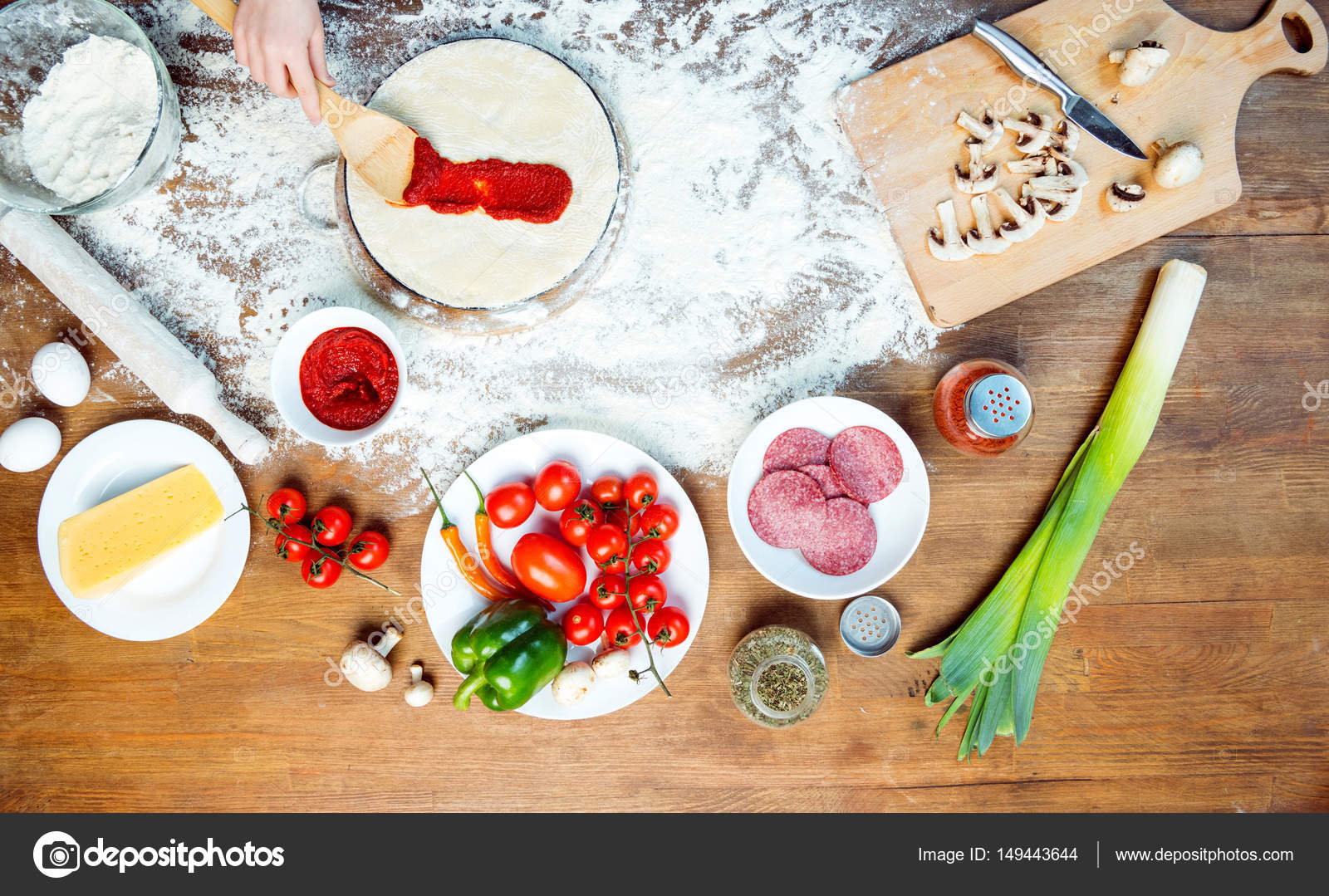 Child making pizza — Stock Photo © IgorTishenko #149443644