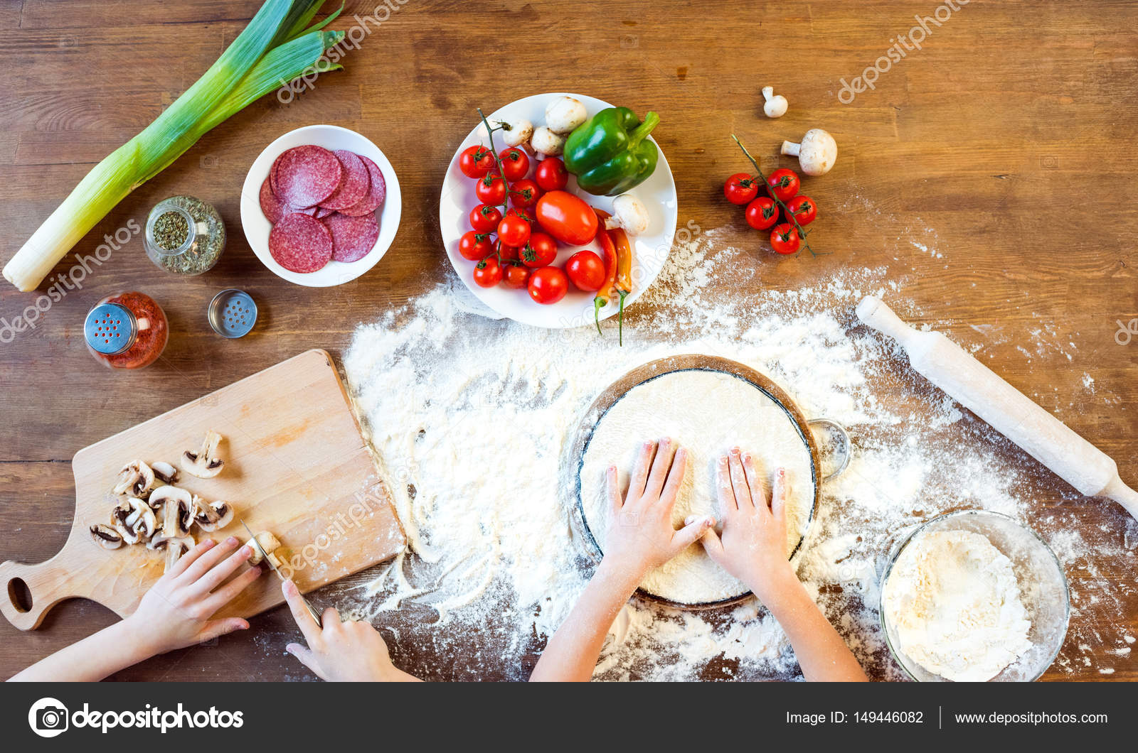 Children making pizza Stock Photo by ©IgorTishenko 149446082