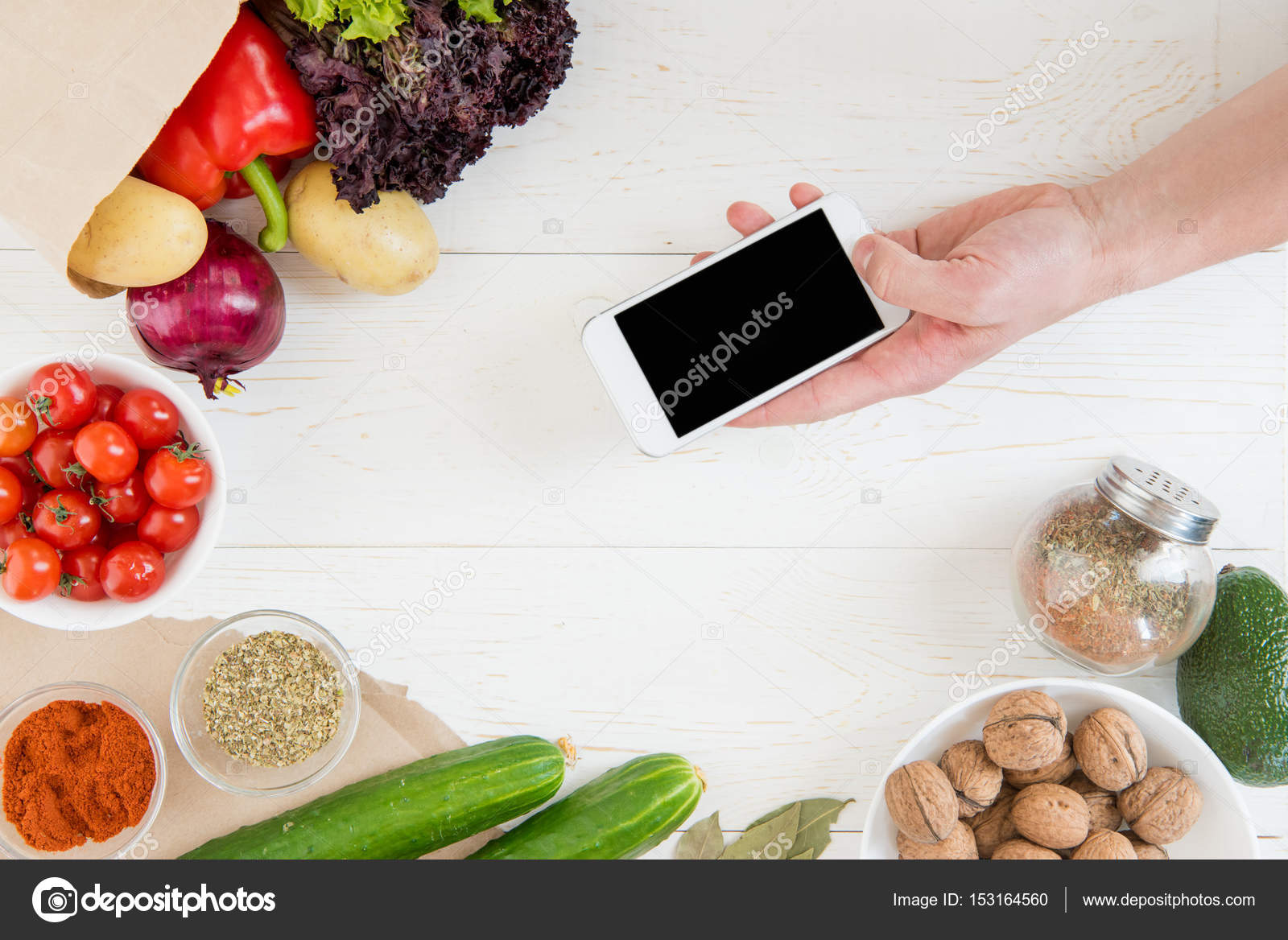 Smartphone over table with vegetables — Stock Photo © IgorTishenko ...