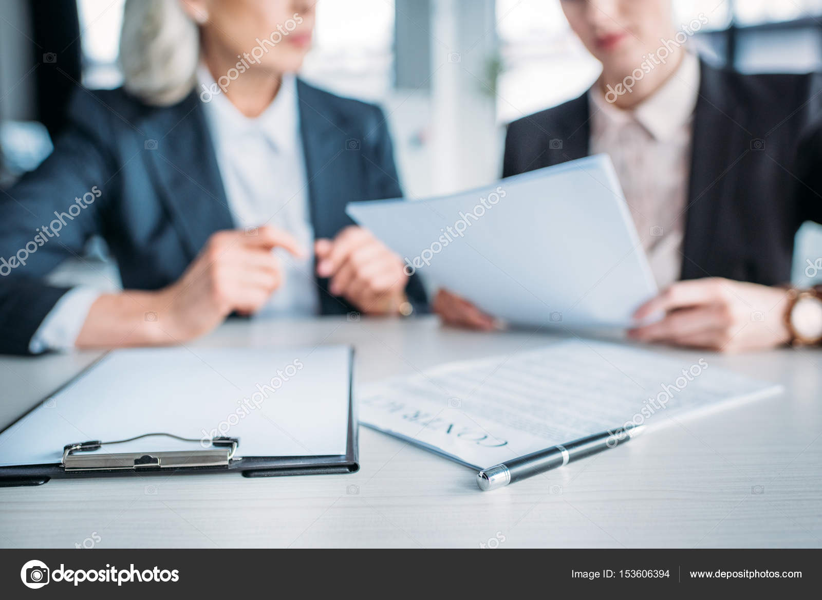 Clipboard and contract on table Stock Photo by ©IgorTishenko 153606394