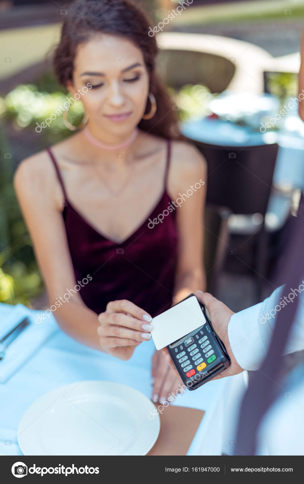 Woman using contactless credit card — Stock Photo © IgorTishenko #161947000