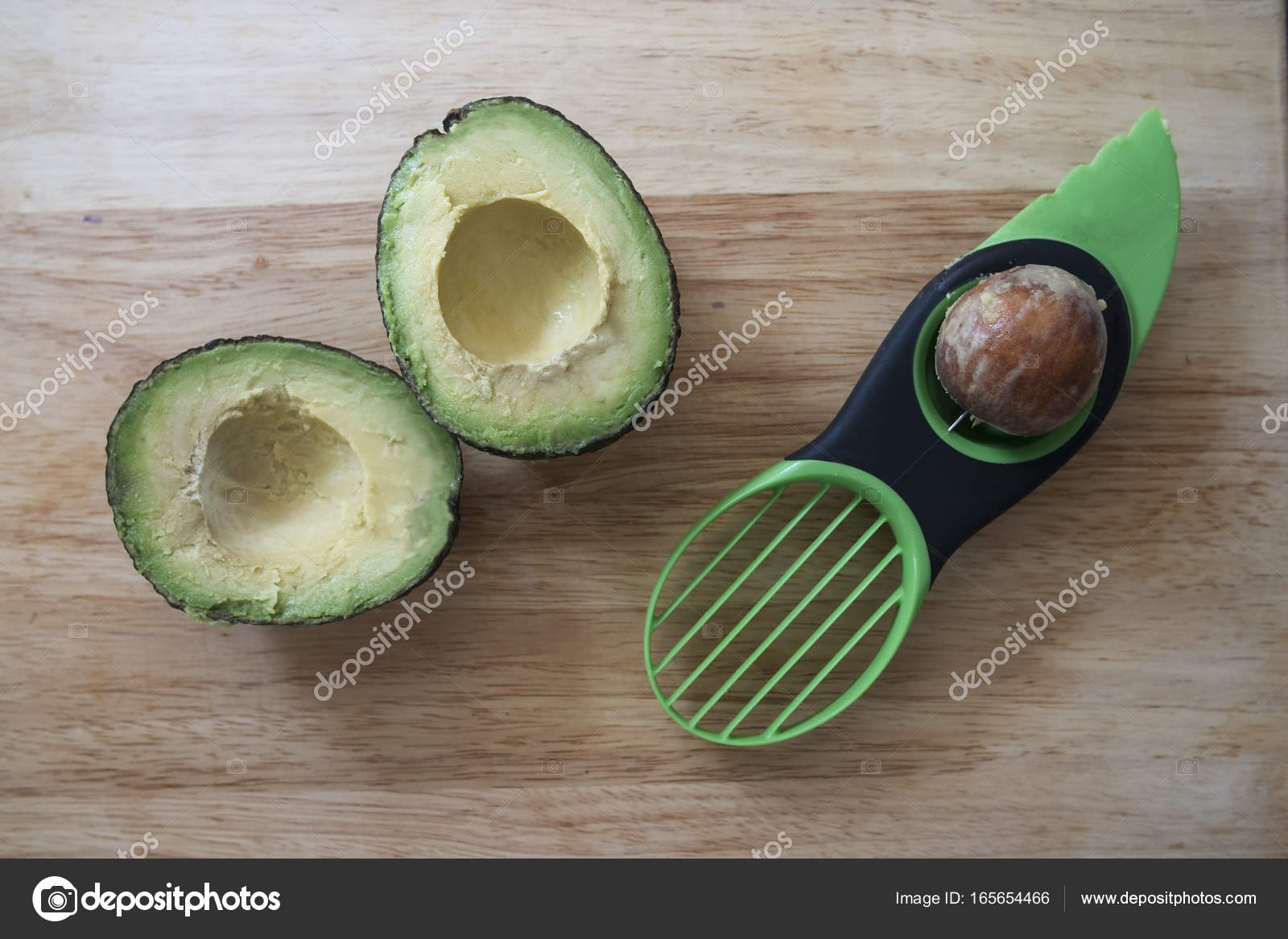 Pitting an Avocado Stock Photo by ©charlotteLake 165654466